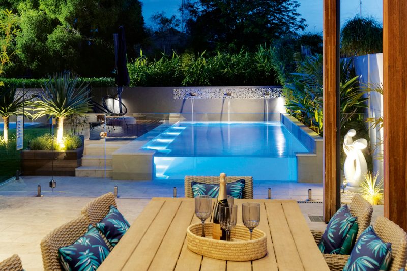 A Raised Pool with Custom Glass Windows Takes Centre Stage - Completehome