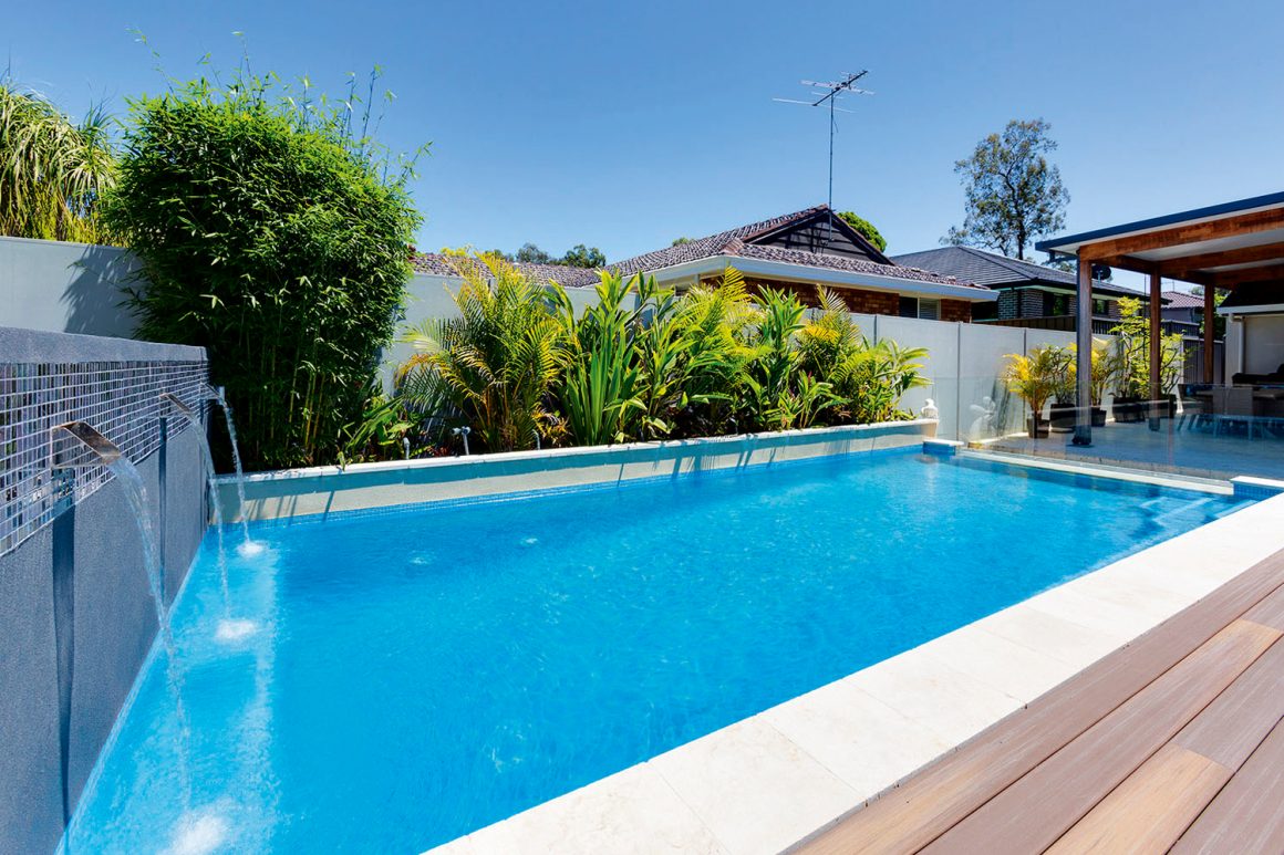 A Raised Pool with Custom Glass Windows Takes Centre Stage - Completehome