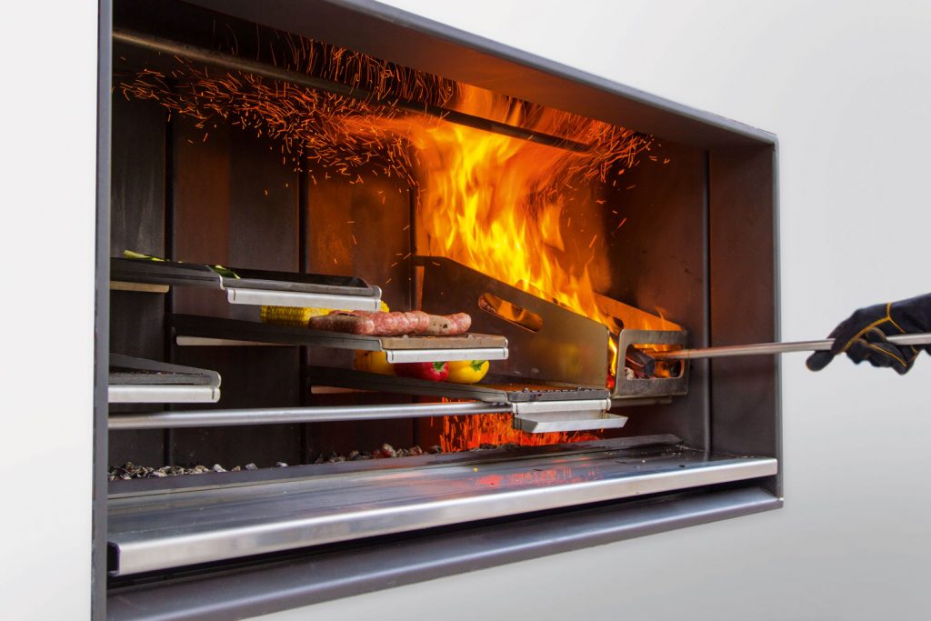 Combine Food with Flame with Escea’s EK Outdoor Fireplace Kitchen.