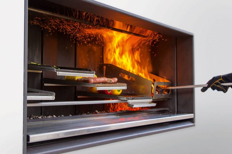 Combine Food with Flame with Escea’s EK Outdoor Fireplace Kitchen.