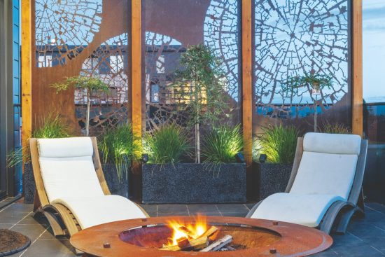 Add some outdoor art to create a calm space that celebrates nature and art