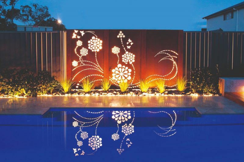 Add some outdoor art to create a calm space that celebrates nature and art