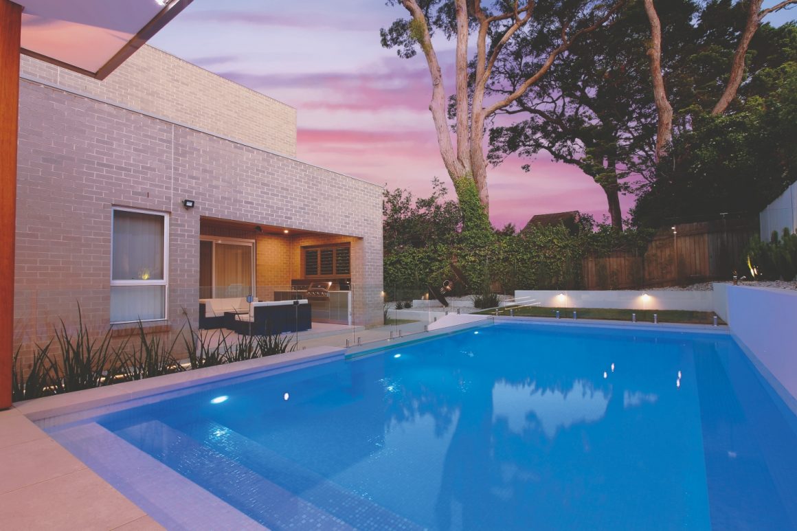This pool is the central feature in a minimalist designer landscape