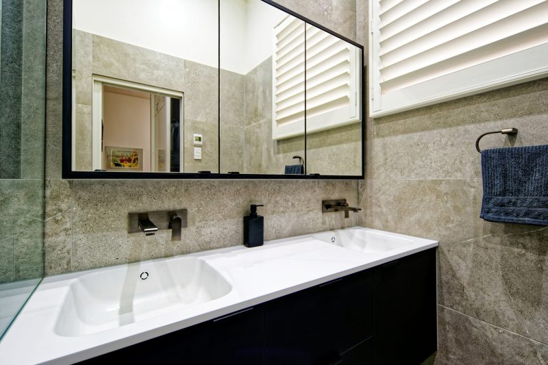 A Compact and Highly Functional Black Bathroom - Completehome