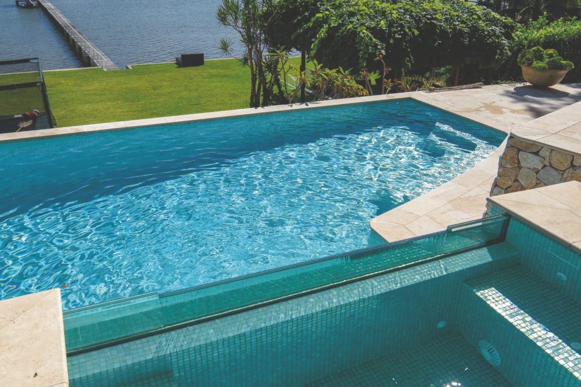 This existing pool and spa received a dramatic transformation ...