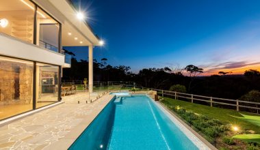 This Melbourne pool uses large-format grey tiles to make a statement