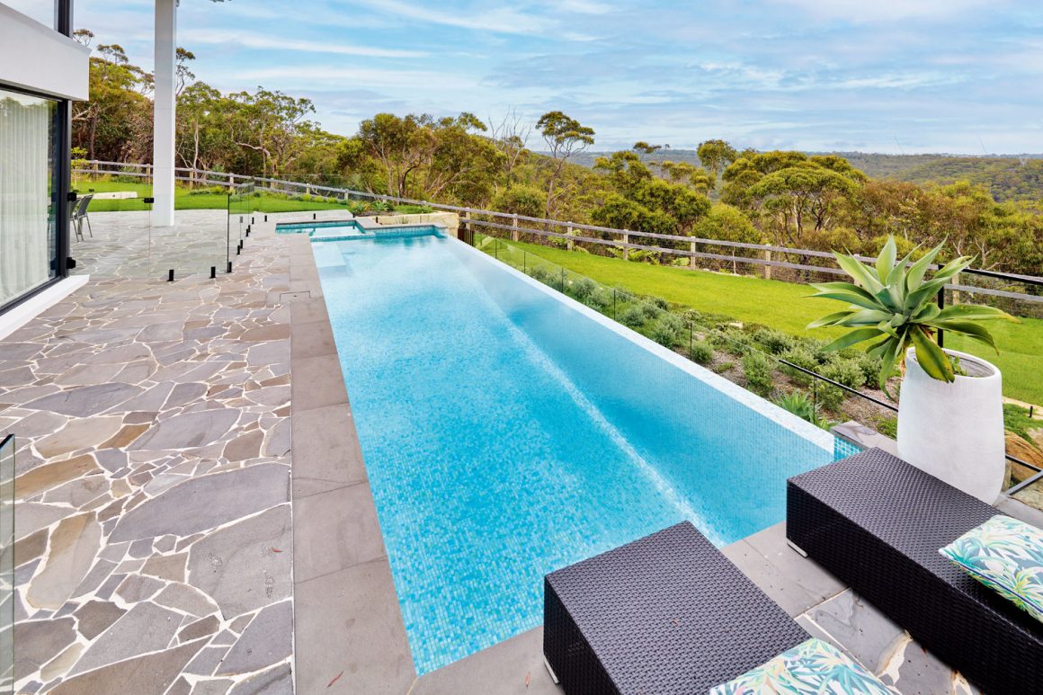 Crystal Pools' Lap Pool and Spa Blend Luxury with Nature's Beauty ...