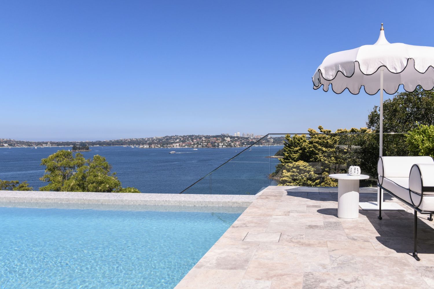 Dive into Luxury: A Pool with Stunning Harbour View - Completehome