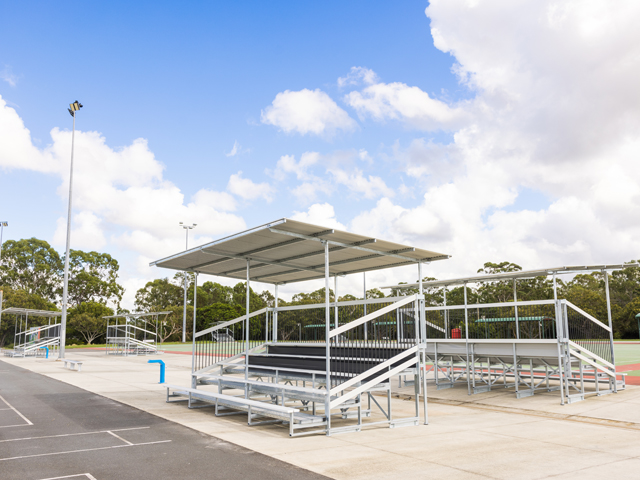 Experience Premium Shaded Grandstand Seating with Steel Post & Rail ...