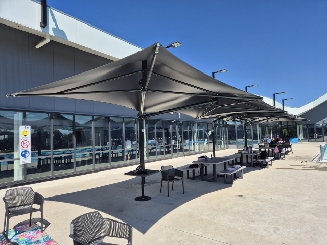 Flexshade® Umbrellas Transform Poolside Seating Area | ODS